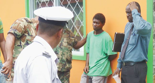 Youth caught throwing bag over prison wall - Searchlight
