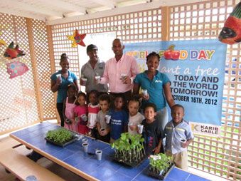 Karib Cable donates seedlings to six schools - Searchlight