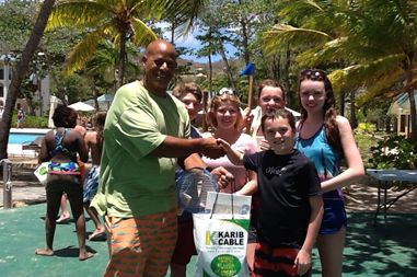 Canadian wins Karib Cable Sandcastle competition - Searchlight