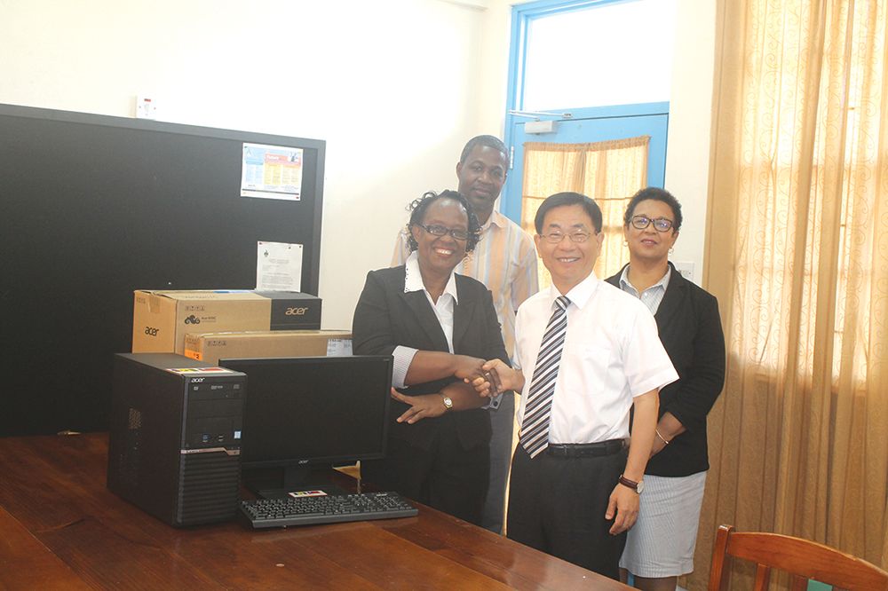UWI Open Campus receives computers from Taiwan - Searchlight