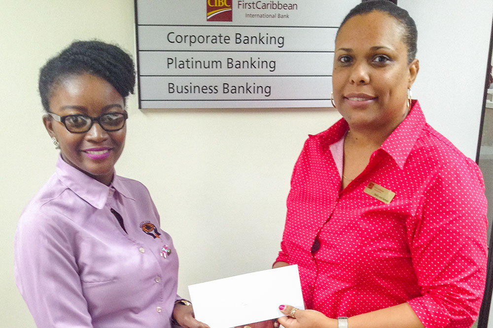 CIBC FCIB makes donation to Melisizwe Brothers Concert in SVG