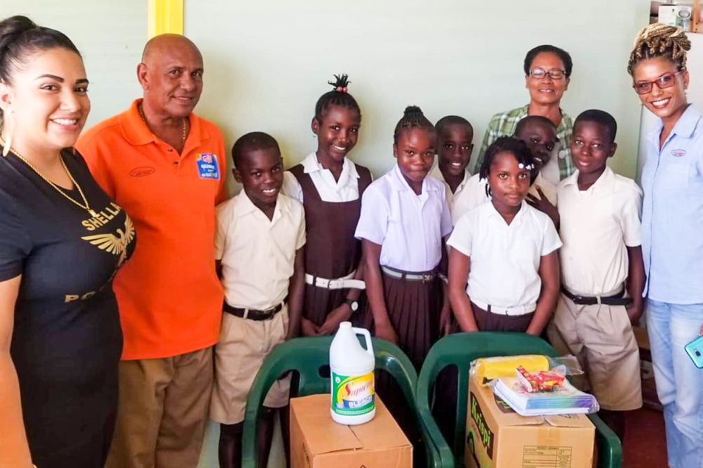 Charitable organization donates school supplies - Searchlight