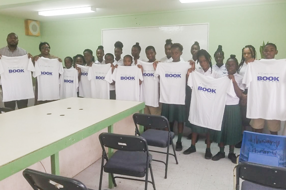 Soca Artiste helps school start Book Club - Searchlight