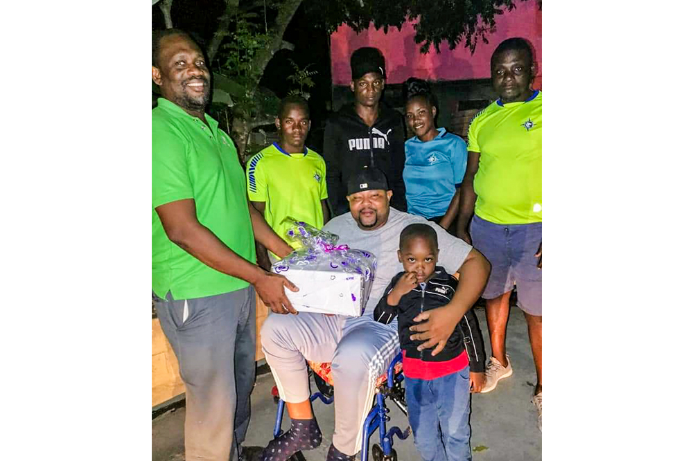 North Leeward Predators make food package donations - Searchlight