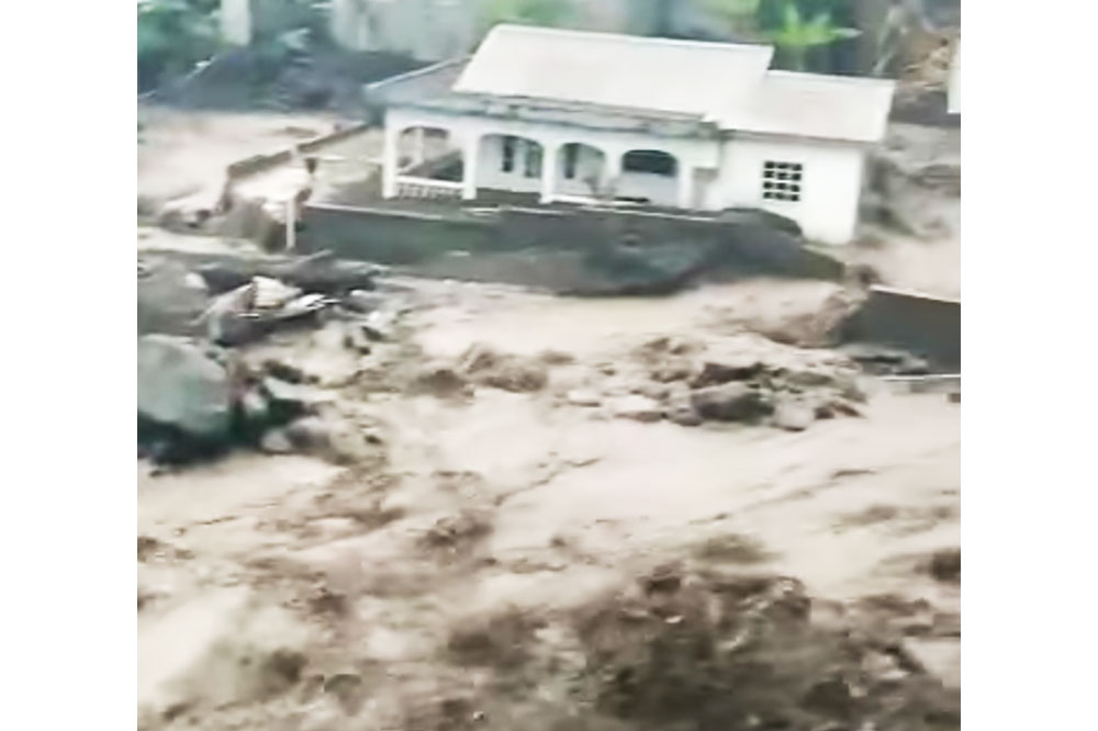 Volcano ravaged villages swamped by heavy rains - Searchlight