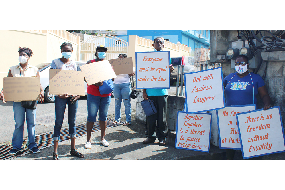 Small group of protesters show up for high profile case - Searchlight