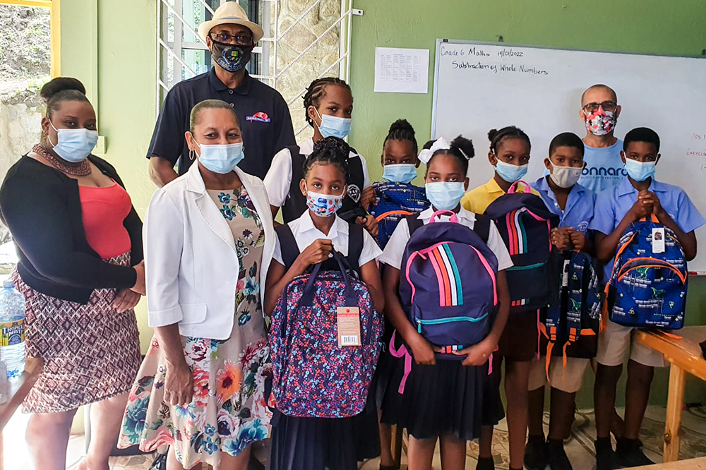 Sunshine Basketball facilitates school supplies donation - Searchlight