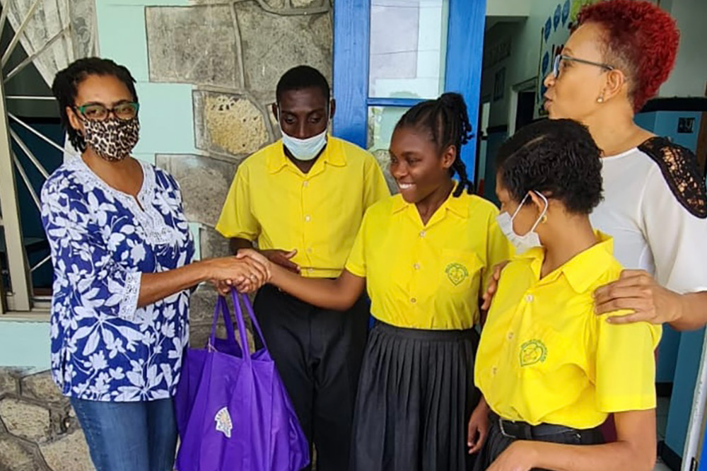 VincyCares Donates School Supplies In Red And Orange Zones