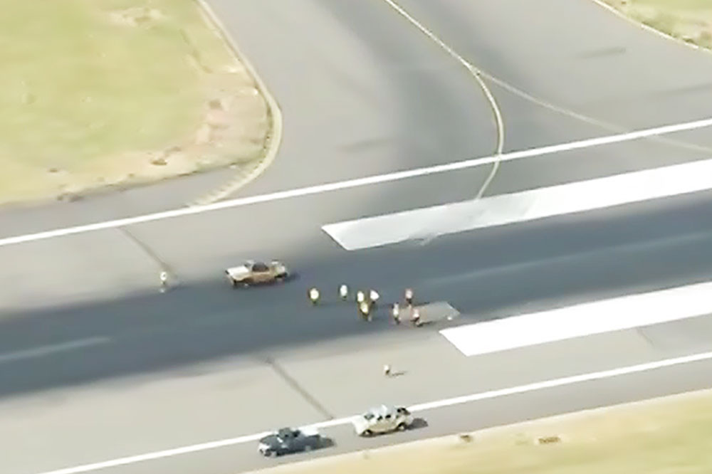 UK airport suspends all flights as heatwave melts runway tarmac ...