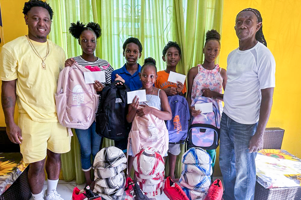 Five students receive school supplies and cash - Searchlight