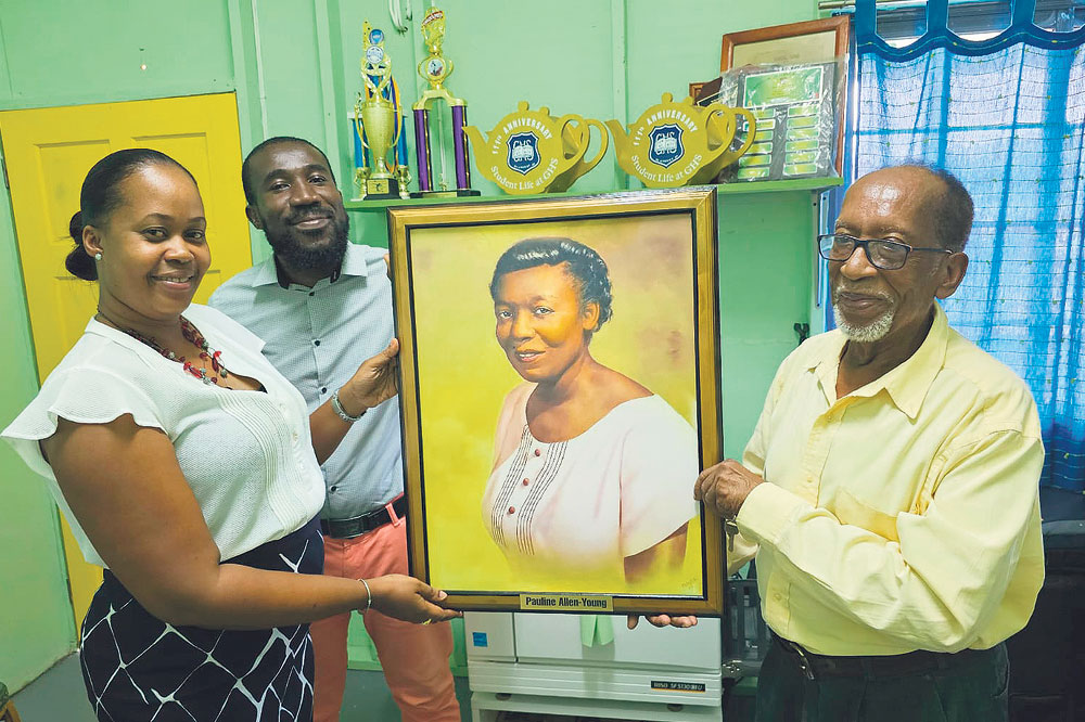 Portrait of former GHS teacher handed over to school - Searchlight