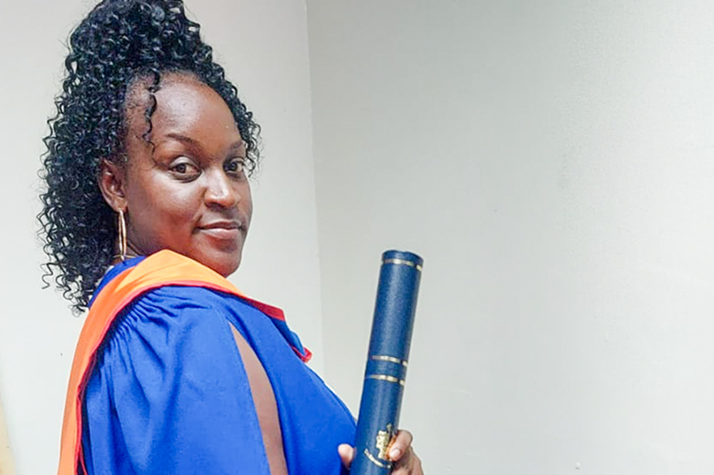Female police officer graduates with master’s degree