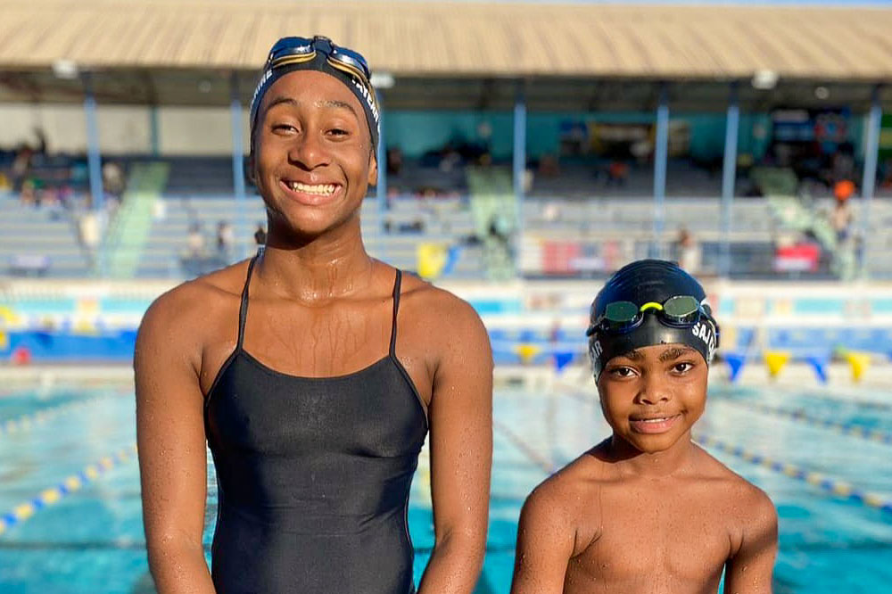 Young swimmers reset eight national records - Searchlight