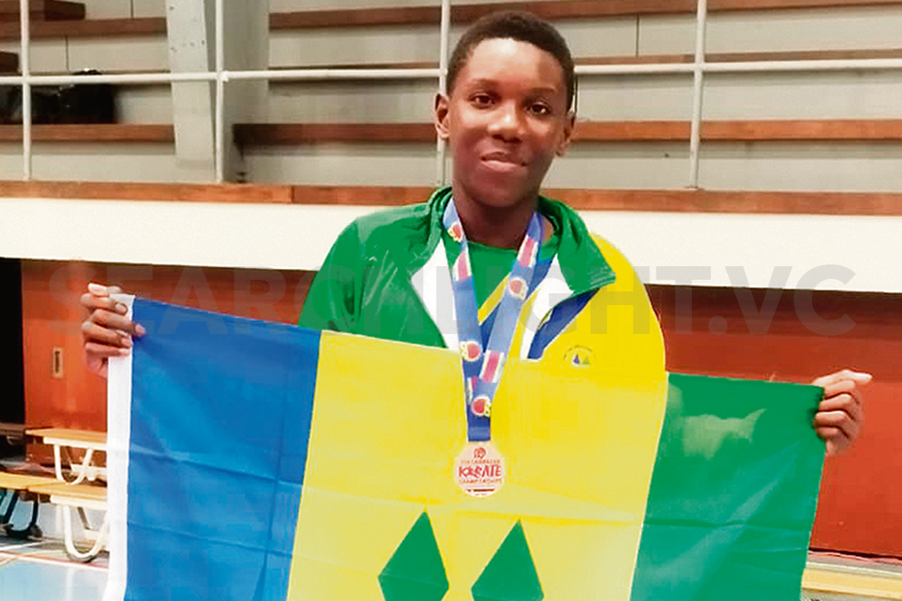 Mc Donald pouches bronze at Caribbean Karate Championships - Searchlight
