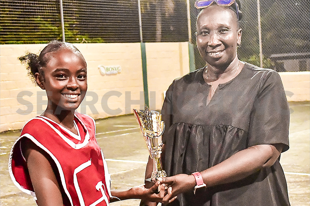Pre-teen netball player on the attack for her North Leeward team ...